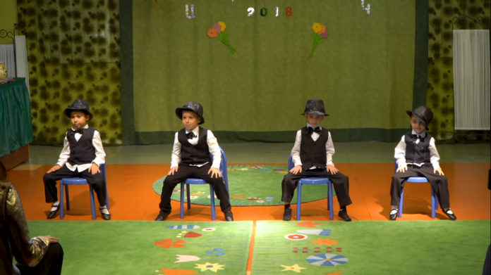 Four preschoolers dress in suits and wow the crowd with their chair ...