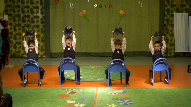 Four preschoolers dress in suits and wow the crowd with their chair ...